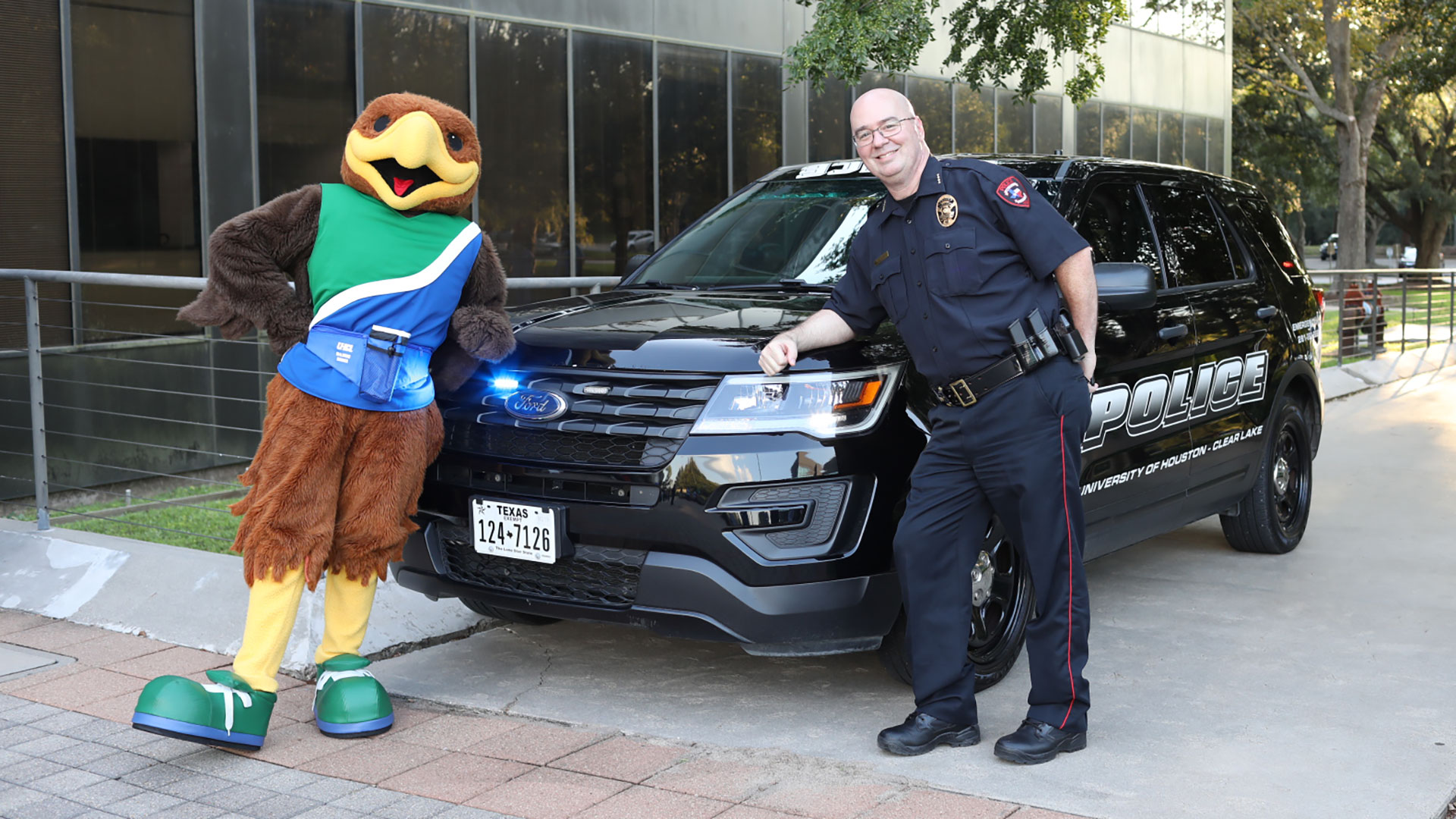 UHCL officer and Hunter the Hawk